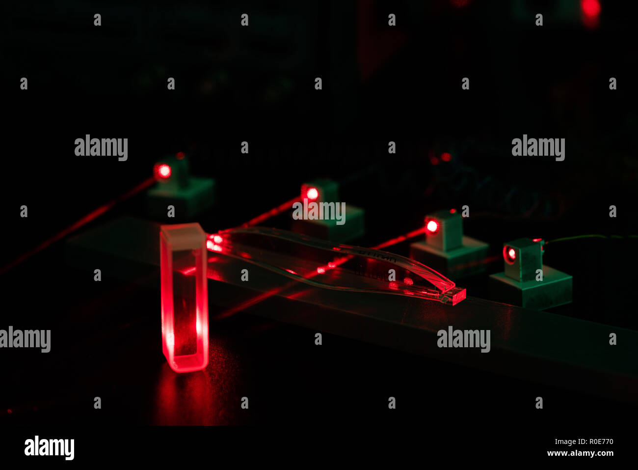 Laser experiment in photonics laboratory Stock Photo - Alamy