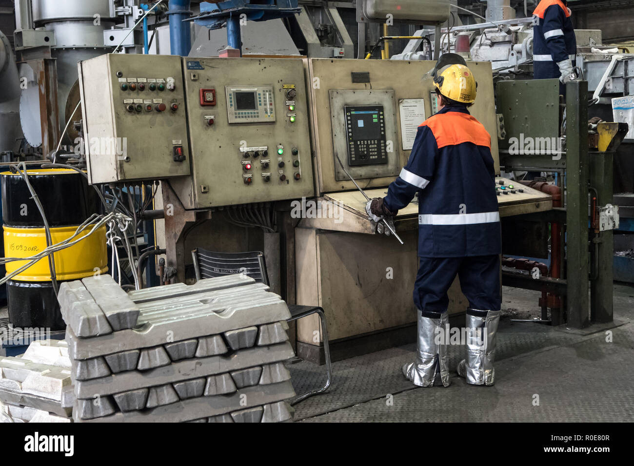 steelworker serving the furnace Stock Photo - Alamy