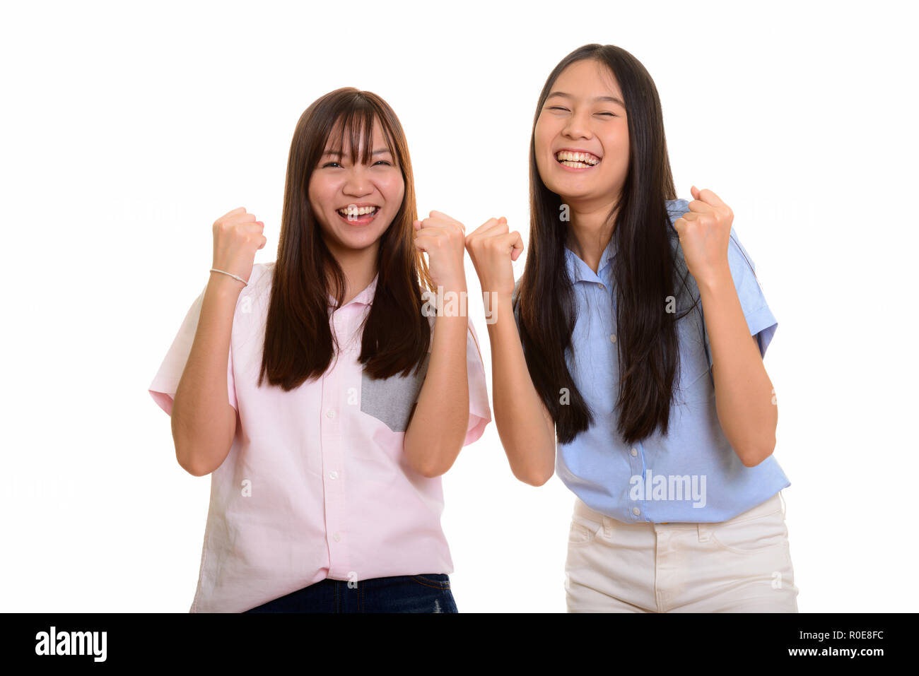 Smiling teen asian girls hi-res stock photography and images - Alamy