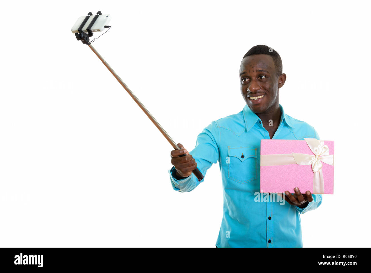 Adult man holding stick hi-res stock photography and images - Alamy