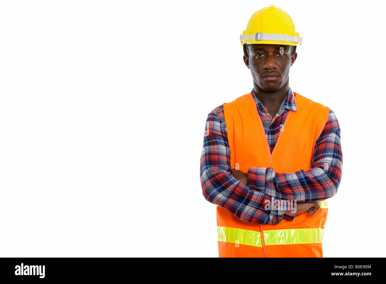 Studio shot of young black African man construction worker with Stock ...