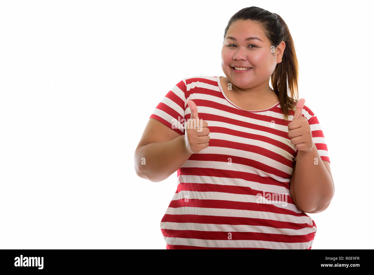 Woman very happy thumbs up hi-res stock photography and images - Alamy