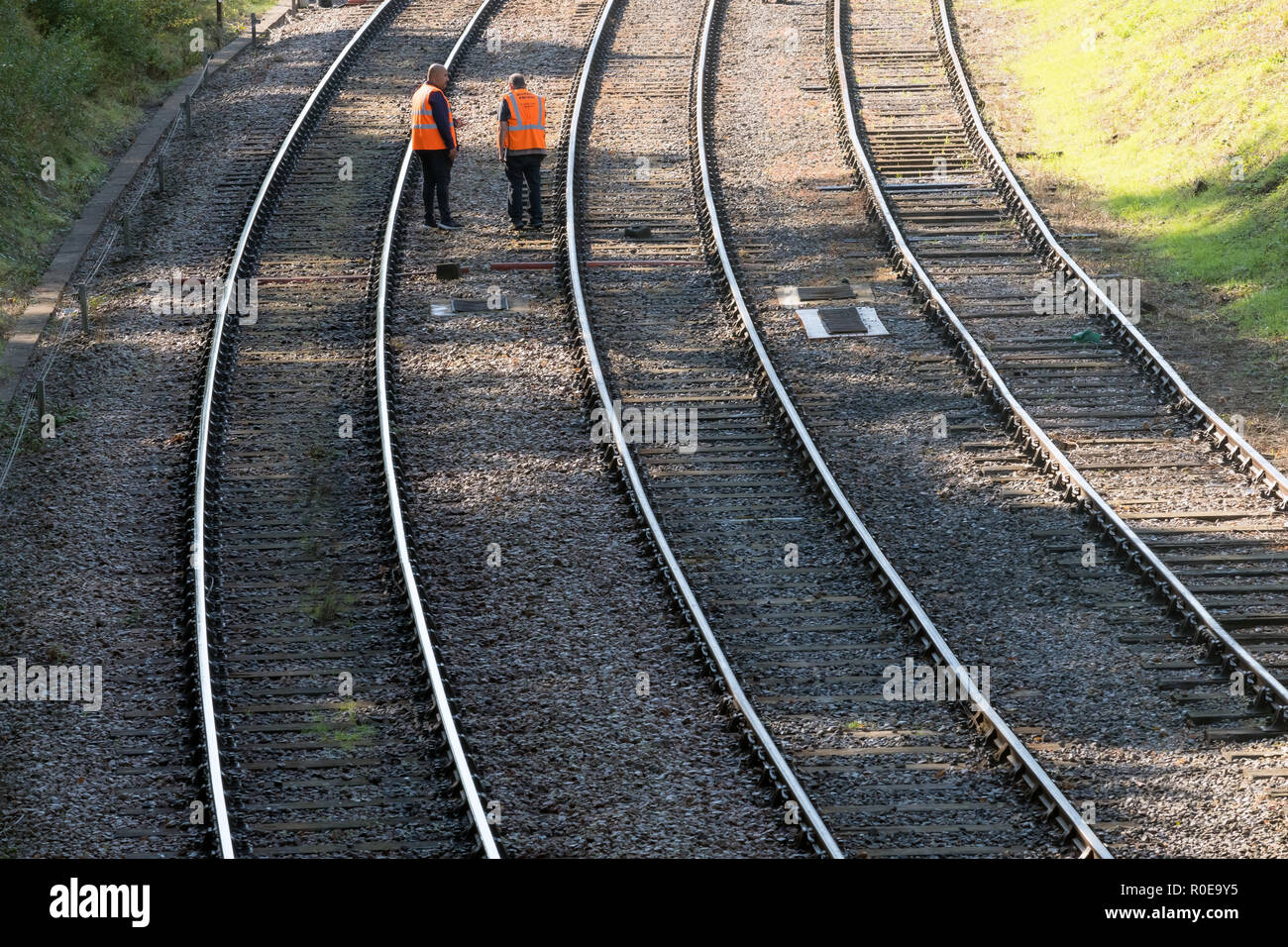 Rail's staff walks on the track at railway Stock Photo - Alamy