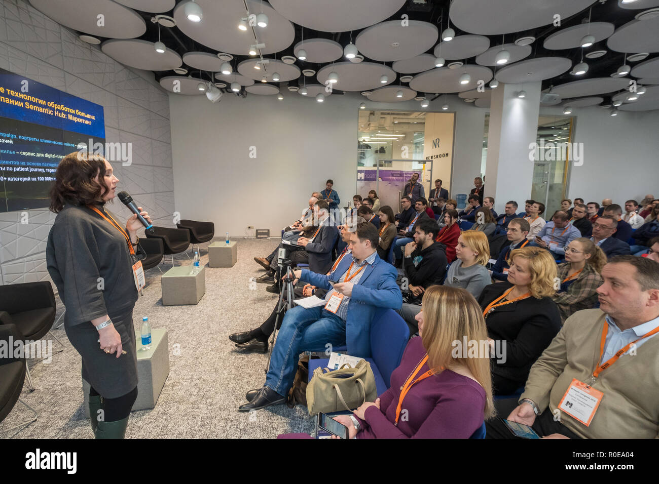 People attend business conference in congress hall Stock Photo - Alamy