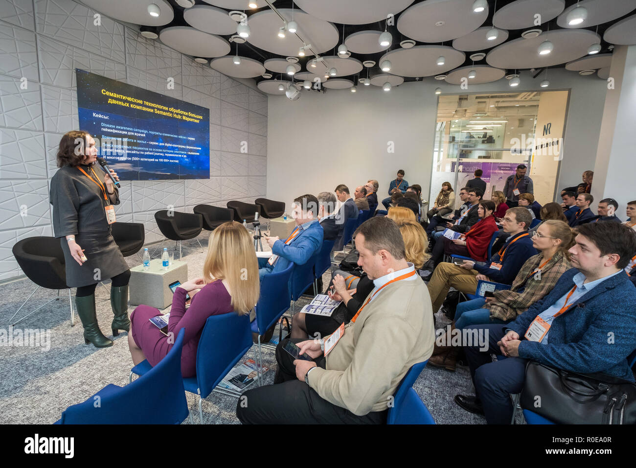People attend business conference in congress hall Stock Photo - Alamy