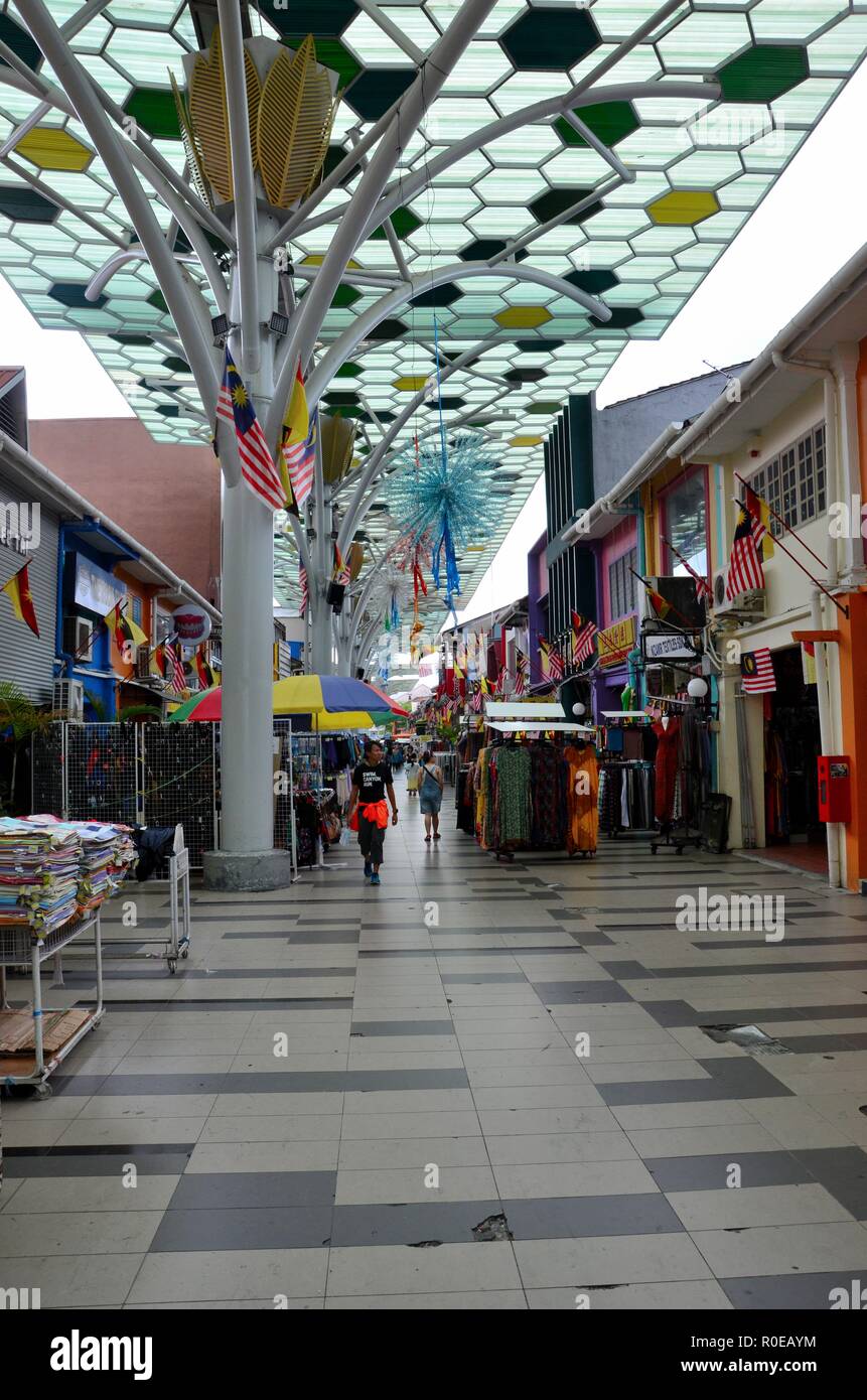 Pedestrians walk and shop on India Street in Kuching Sarawak Malaysia ...