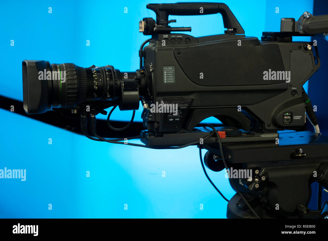Close-up of a Television Camera in a blue screen studio environment ...