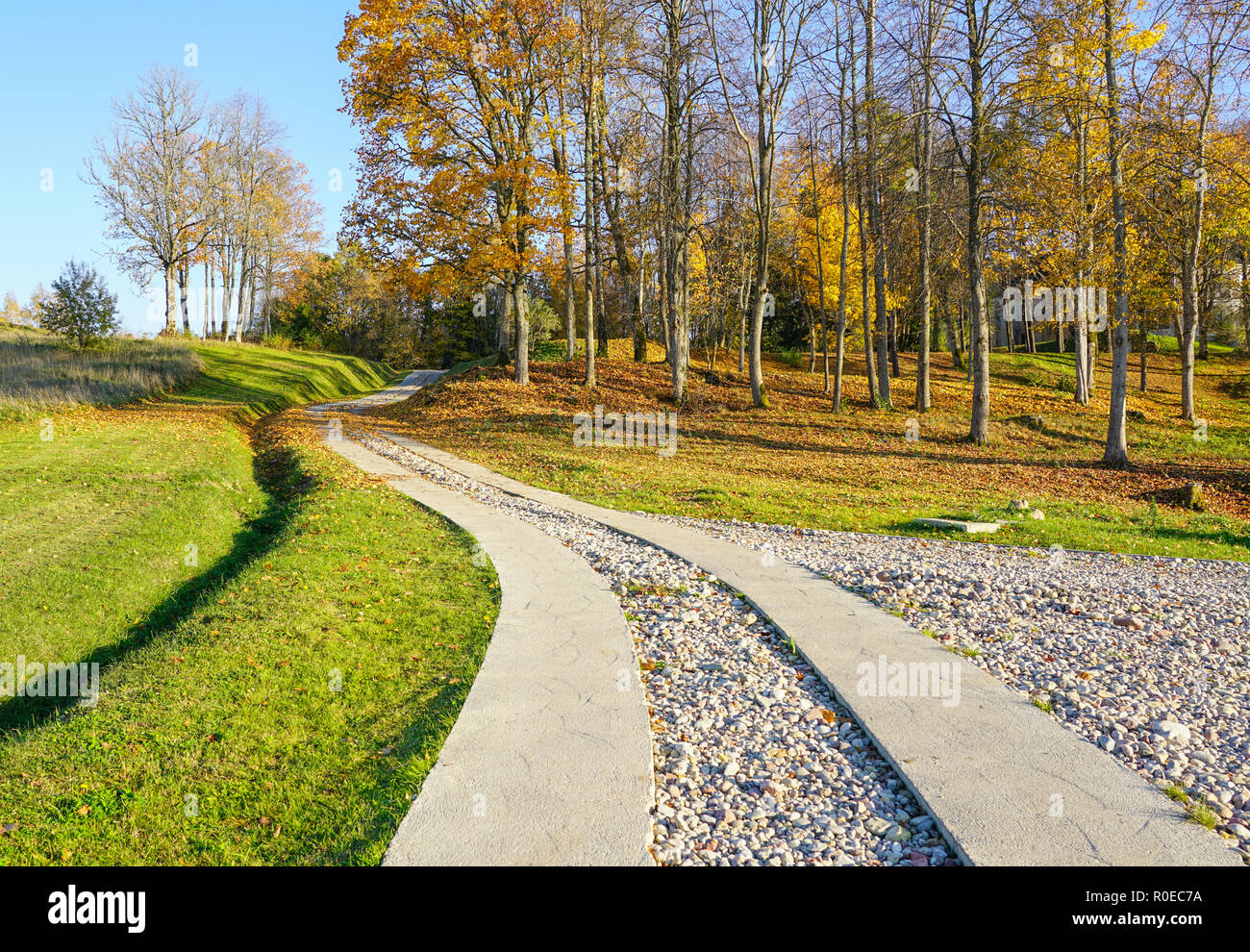 winding walking path to the nature park in the fall Stock Photo - Alamy