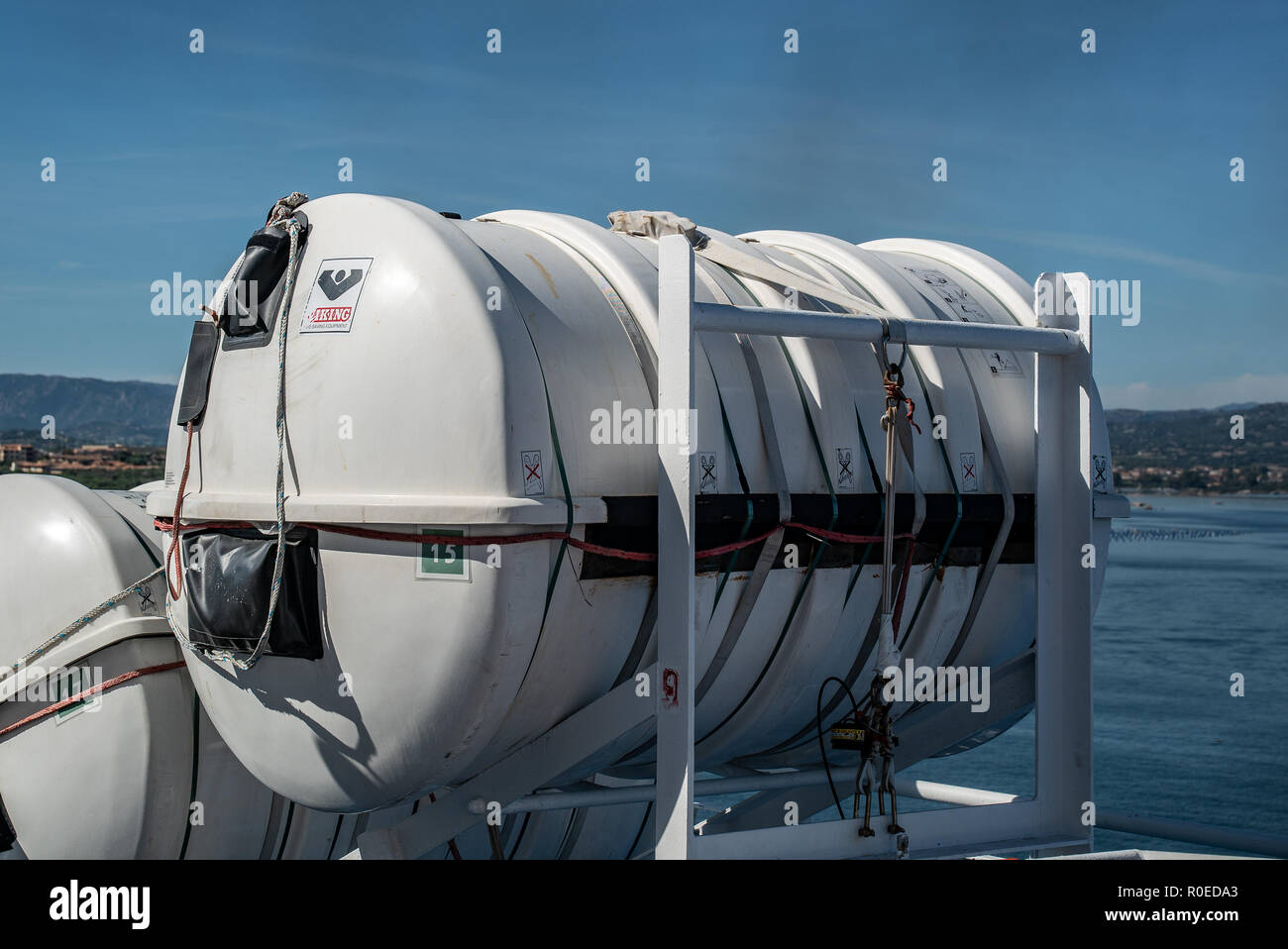 Barrels containing emergency boat and rations for a cruise ship ...