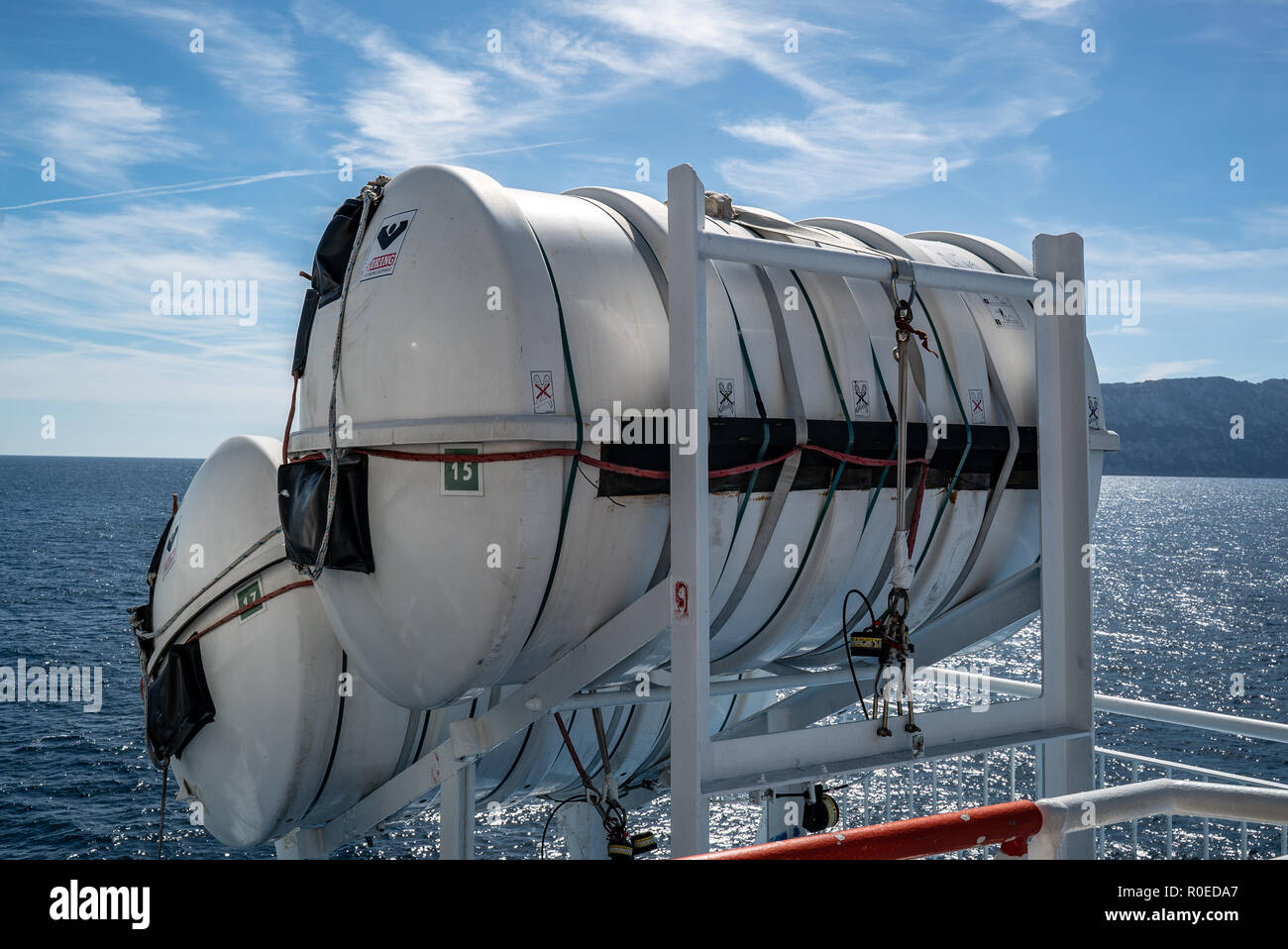 Barrels containing emergency boat and rations for a cruise ship ...