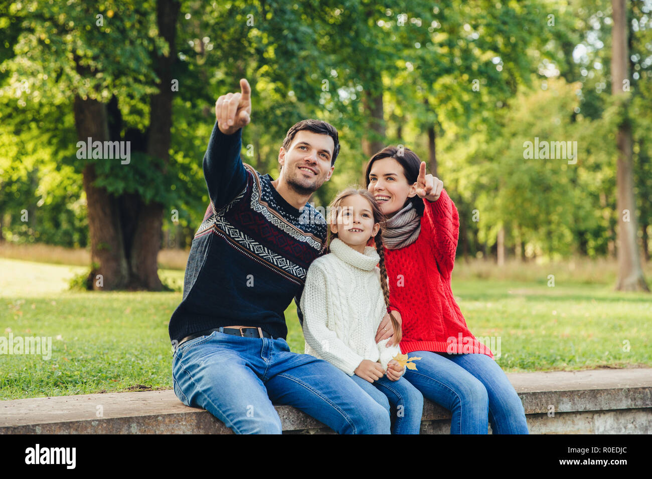 Child pointing at trees hi-res stock photography and images - Alamy