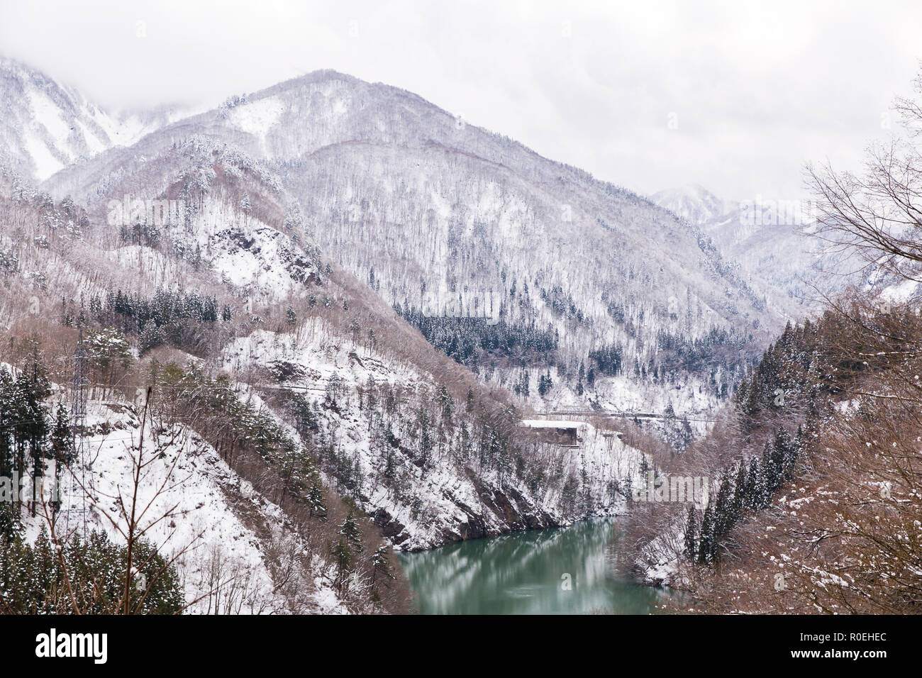 Train in Winter landscape snow on bridge Stock Photo - Alamy