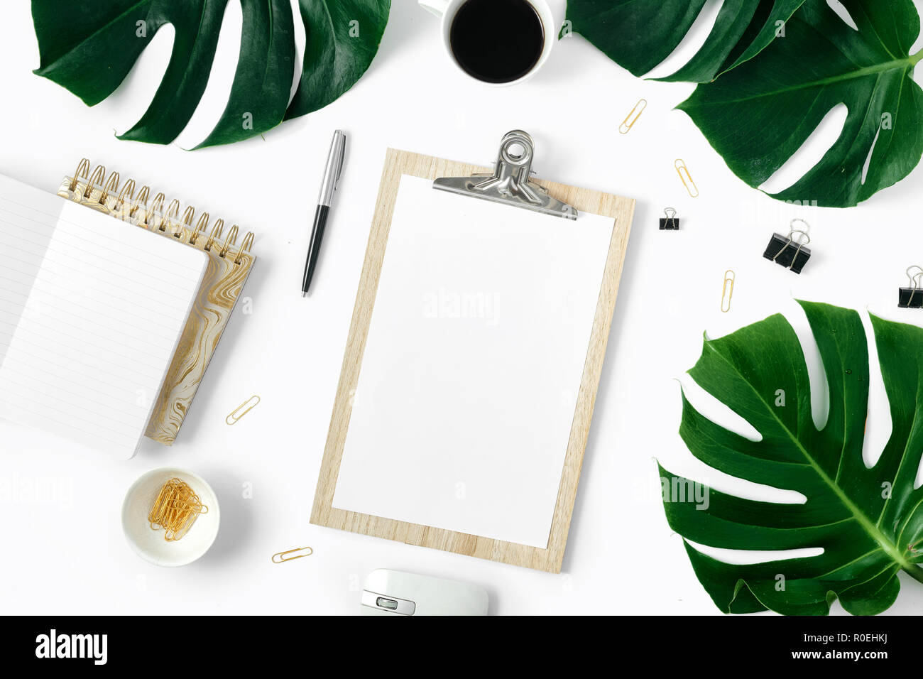 Stylish office table desk. Modern female workspace with monstera leaves ...