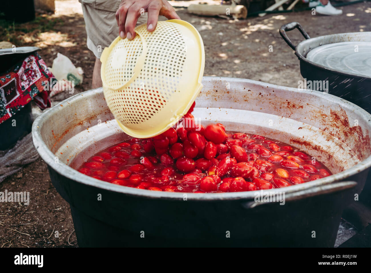 The traditional preparation of the tomato sauce in the south of italy ...