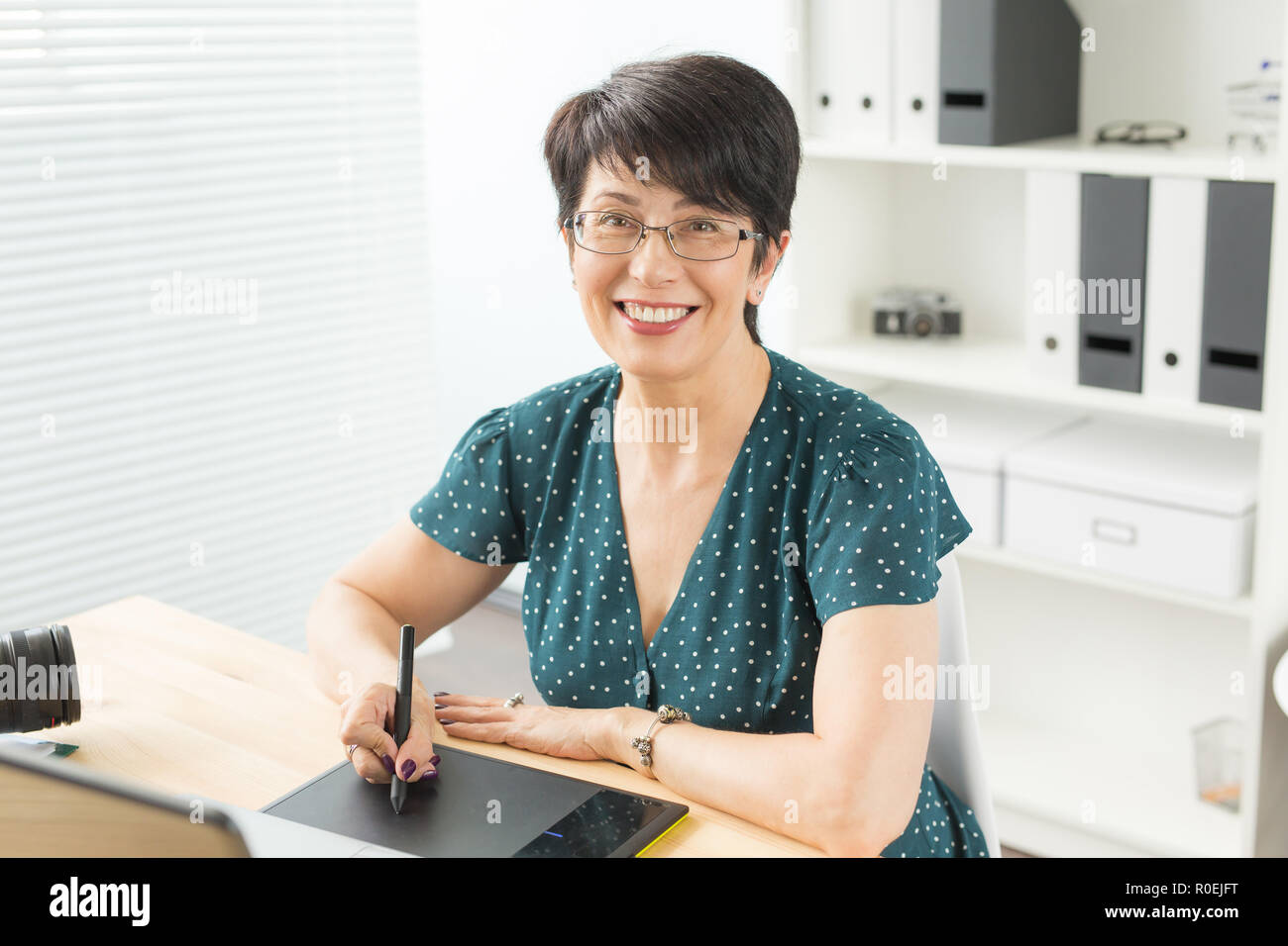 Office, graphic designer concept - Business woman hands holding digital ...