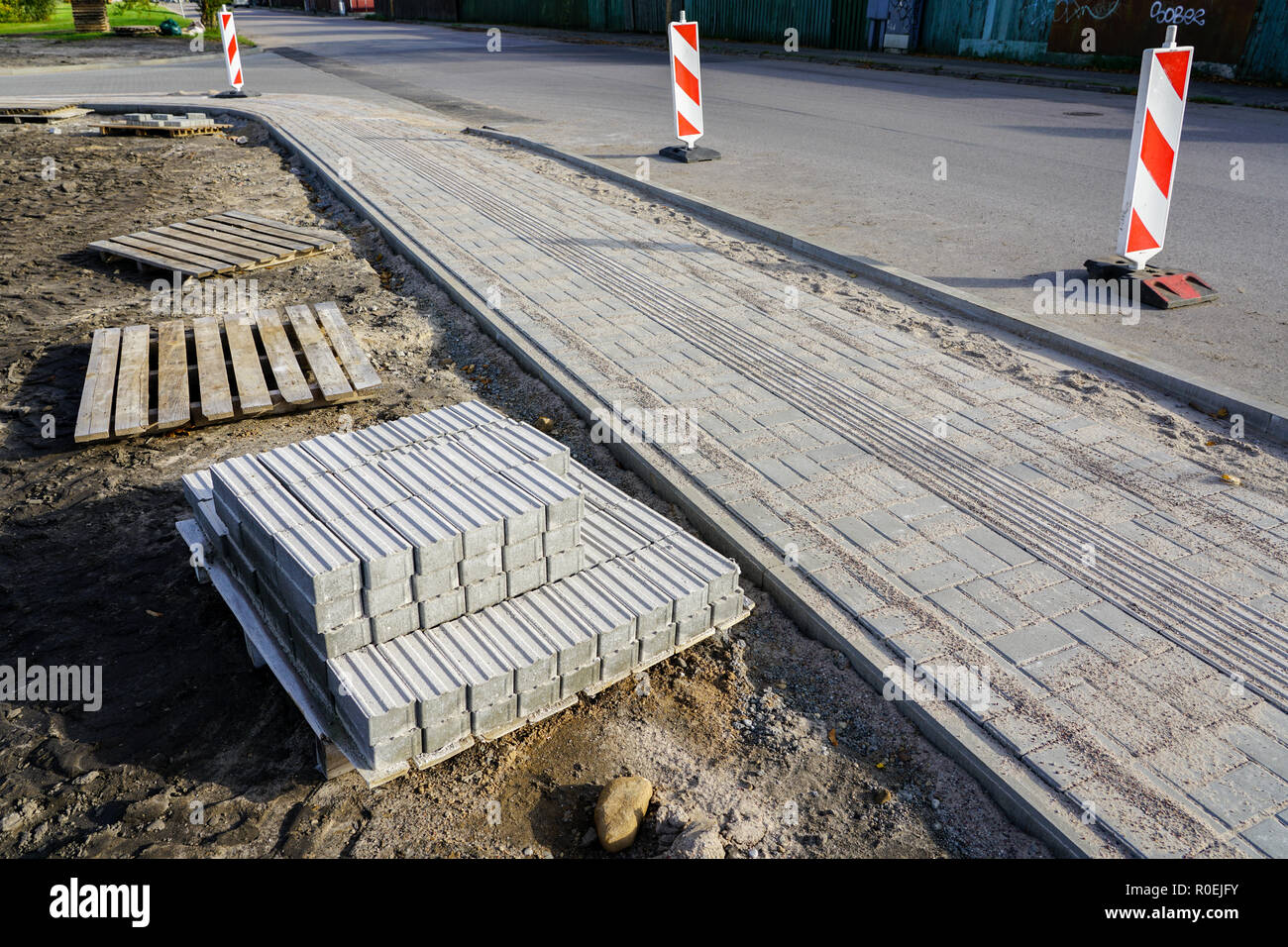 New pavement paving with integrated guidelines for people with visual ...