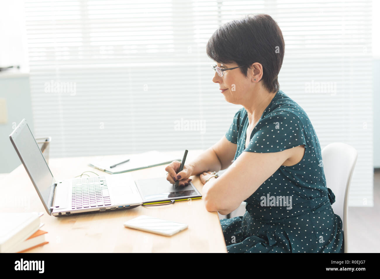 Office, graphic designer concept - Business woman hands holding digital ...