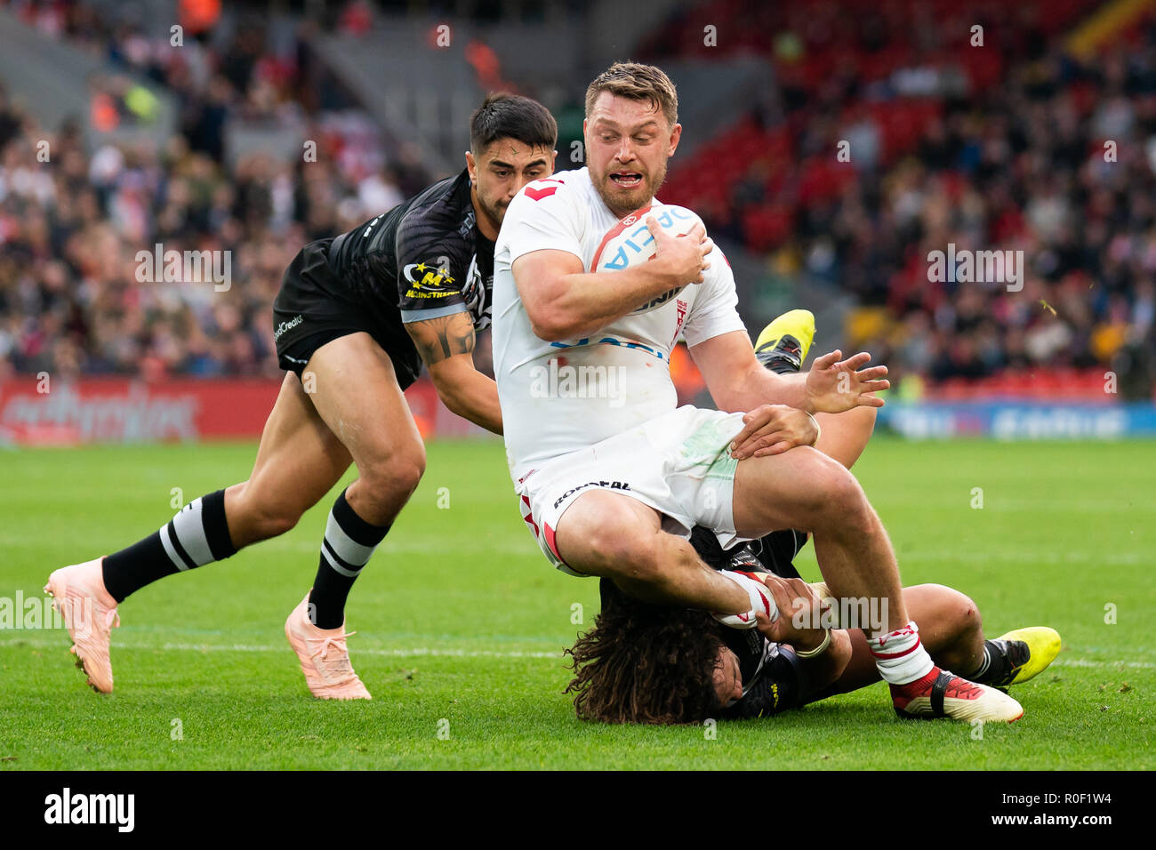 England's Tom Johnstone is tackled. 4th November, Anfield, Liverpool ...