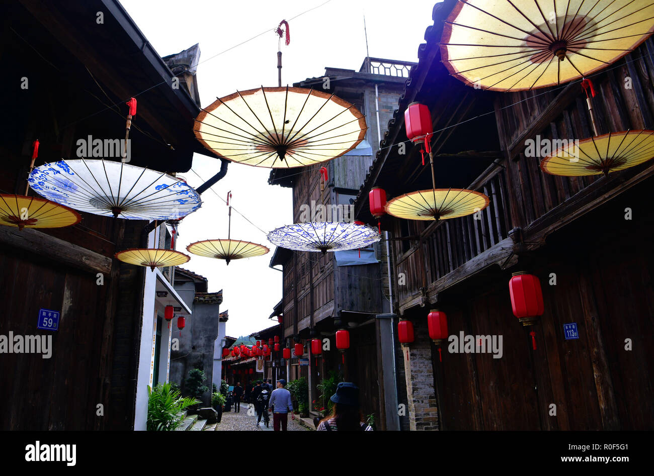 Shaowu. 4th Nov, 2018. An alley decorated with umbrella is seen in the ...