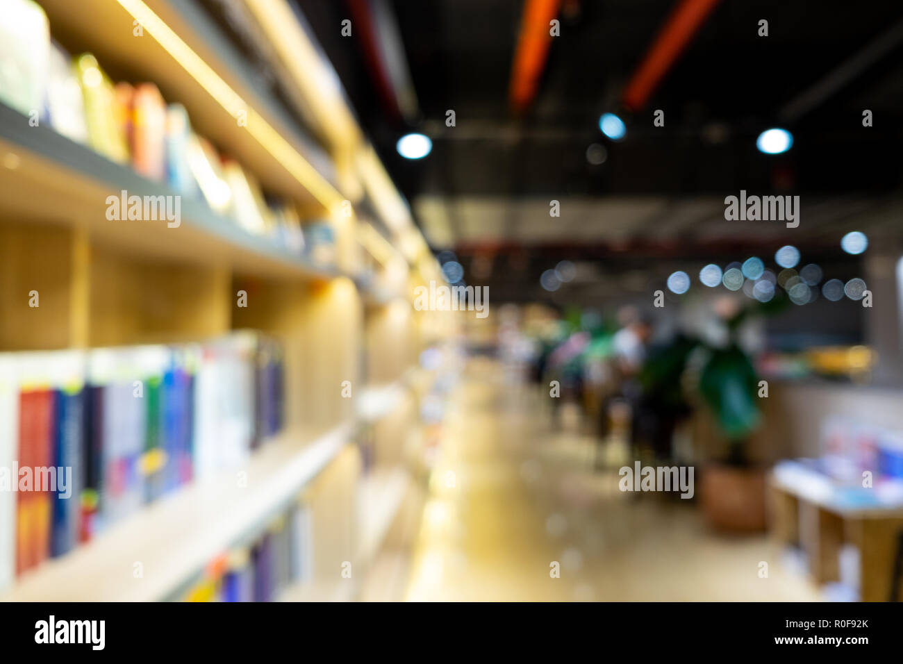 Blur scene from inside of a bookstore, can be used as a background for ...