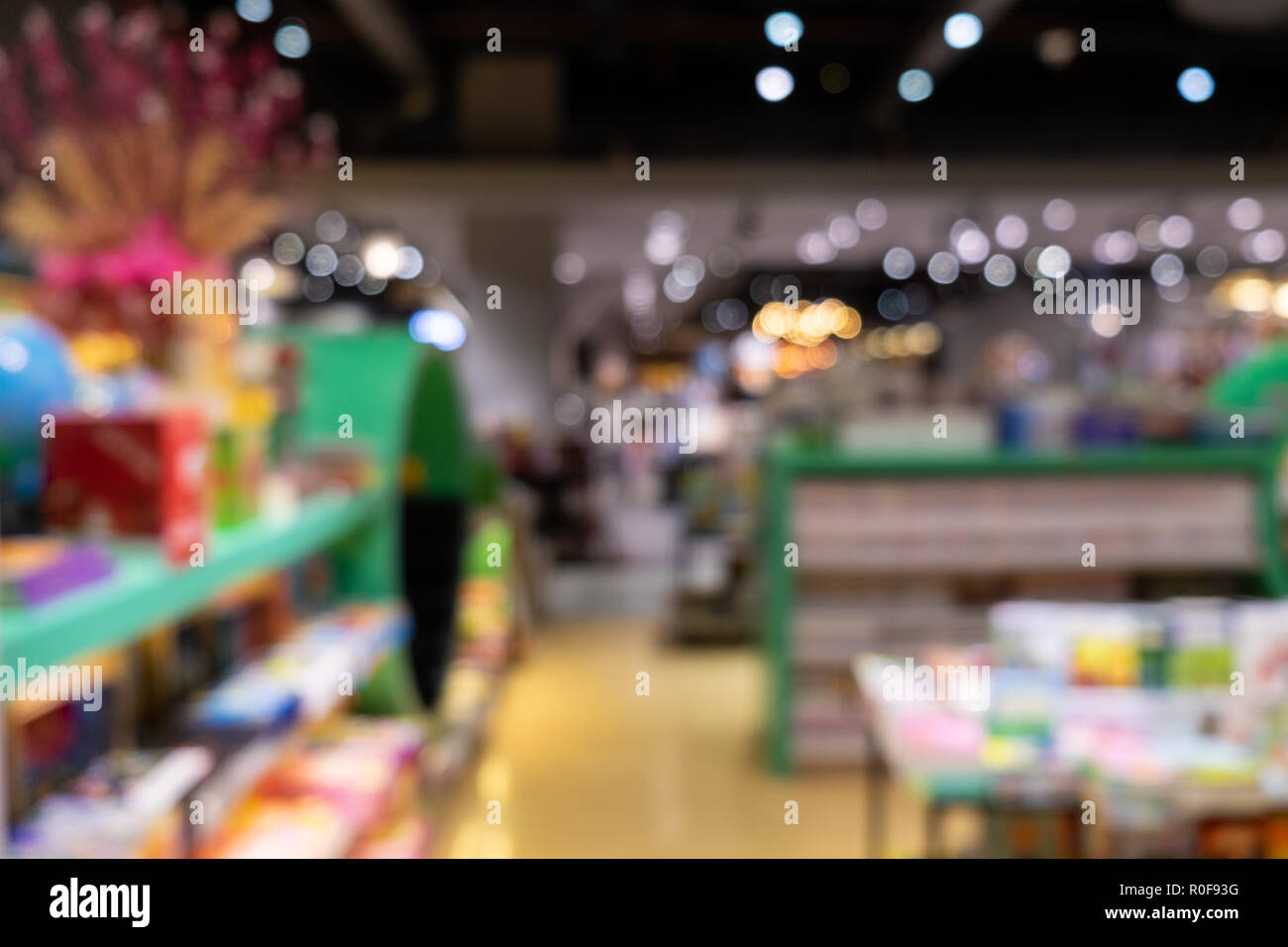 Blur scene from inside of a bookstore, can be used as a background for ...