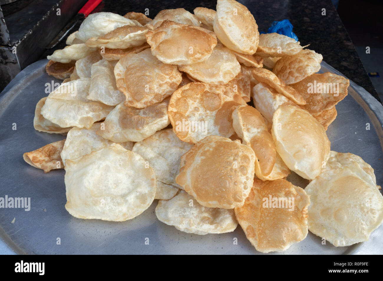 Indian fried puri bread hi-res stock photography and images - Alamy
