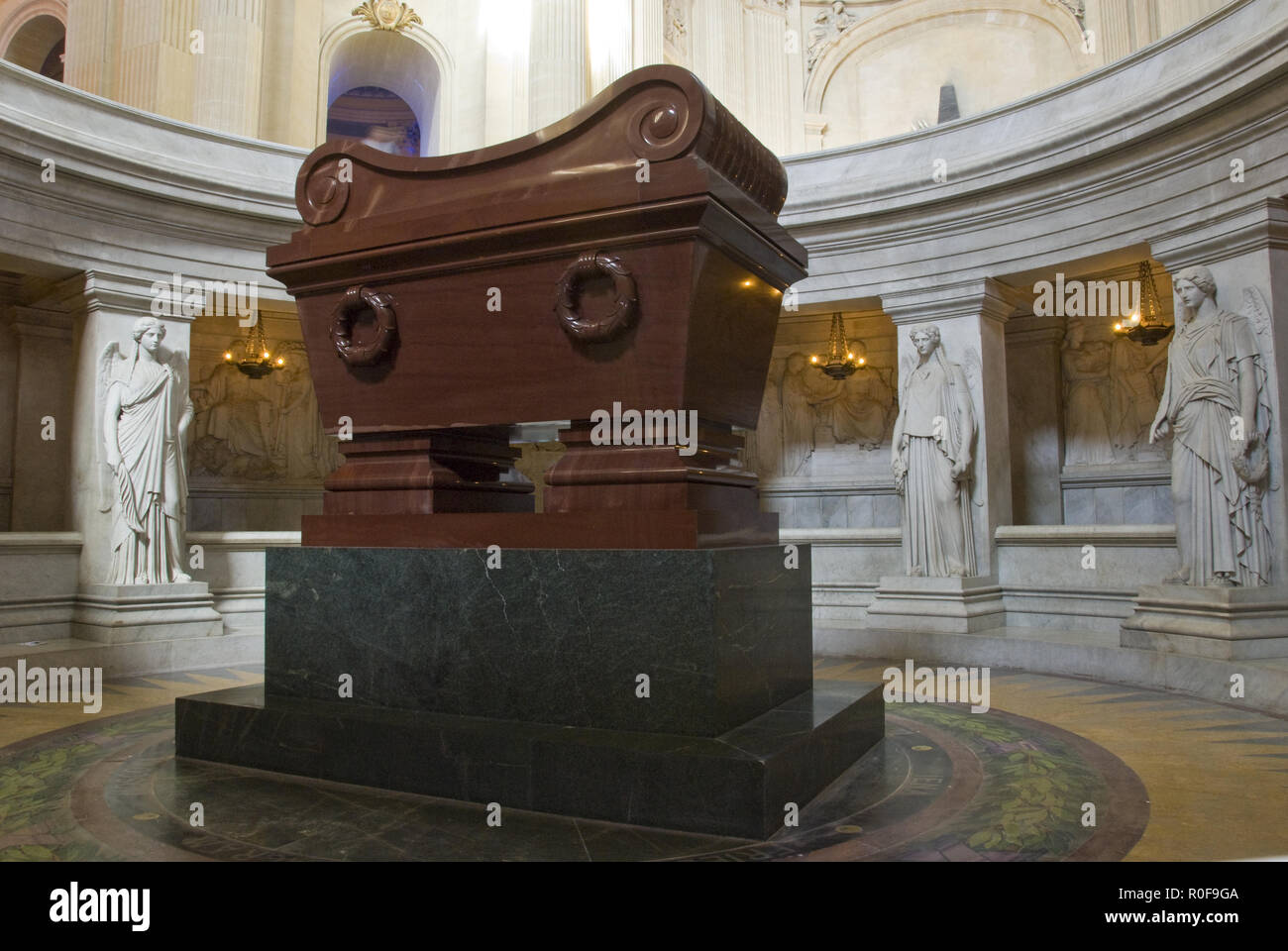 The red quartzite and granite tomb of emperor Napoleon Bonaparte at Les Invalides, in Paris ...