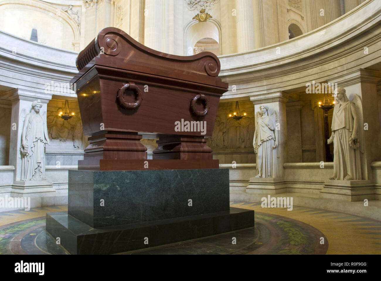 The red quartzite and granite tomb of emperor Napoleon Bonaparte at Les Invalides, in Paris ...