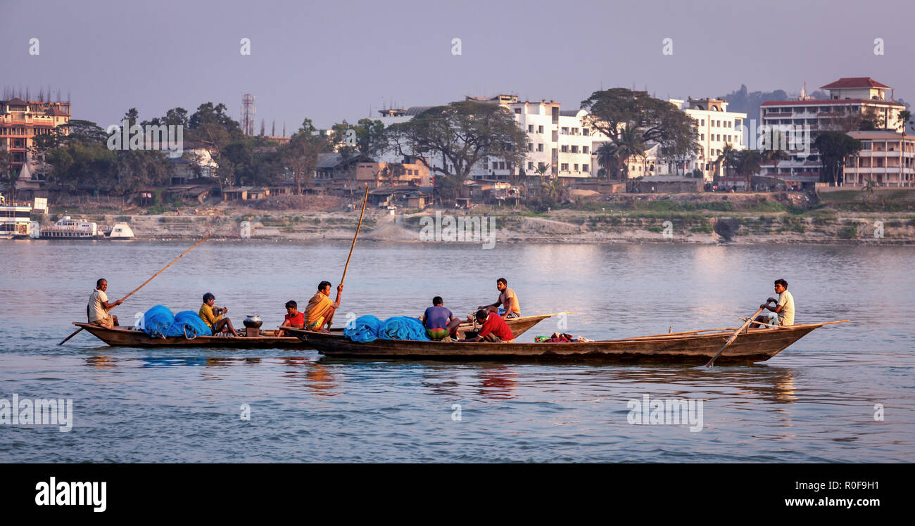 Passengers in small boats on Brahmaputra River, Guwahati, Assam, India ...