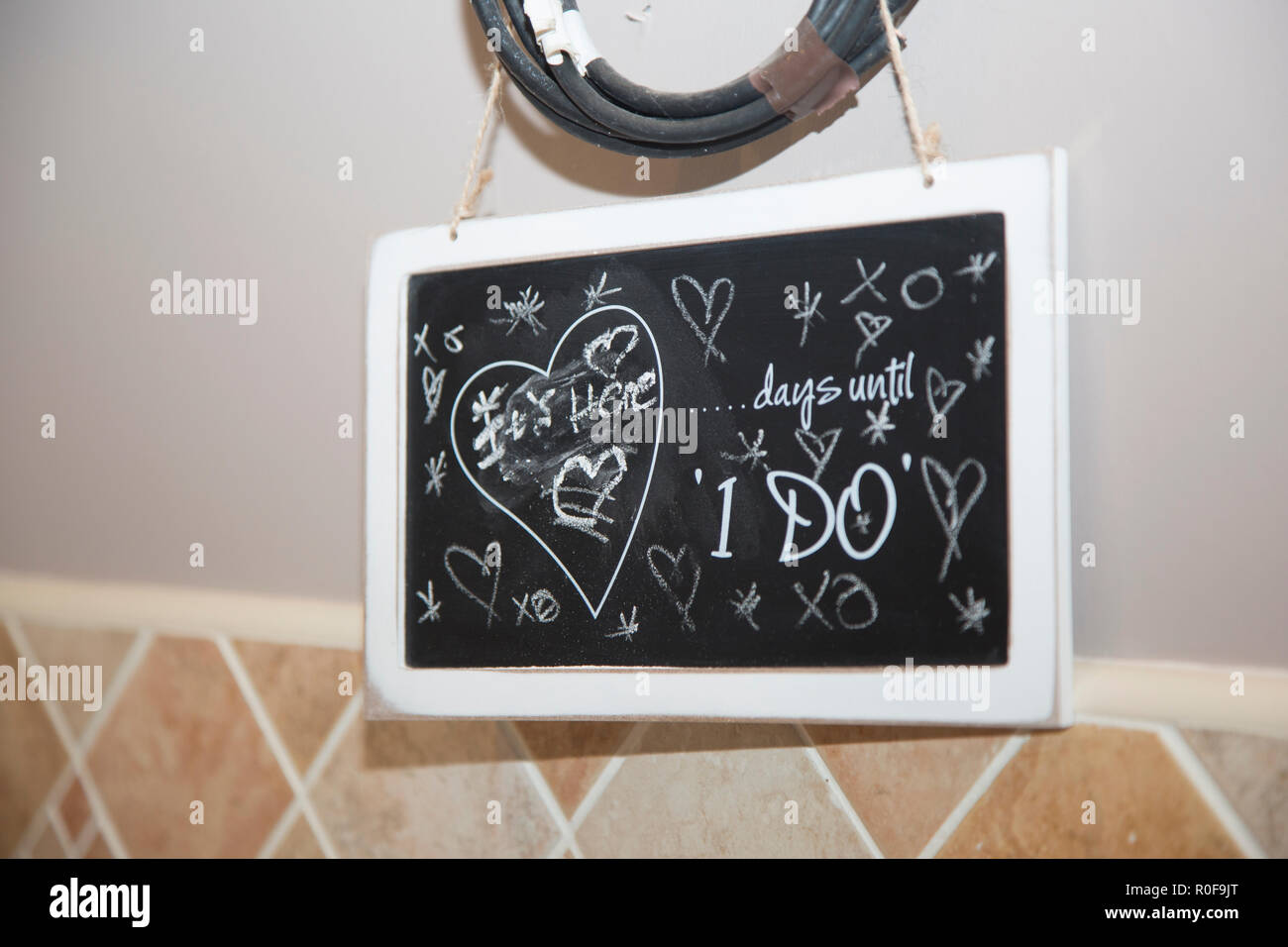 chalkboard sign counting down the days until the couple get married ...