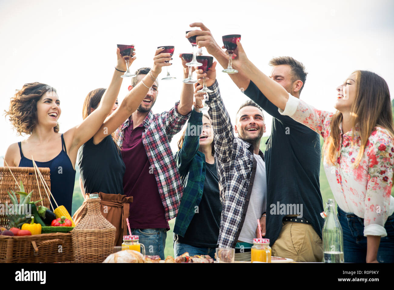 Group of young happy friends having pic-nic outdoors - People having ...