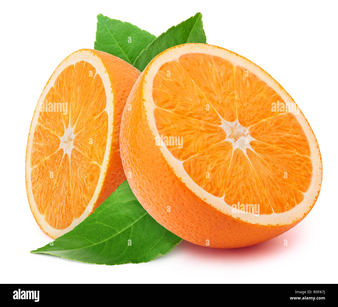 Perfectly retouched sliced halves of oranges with leaves isolated on ...