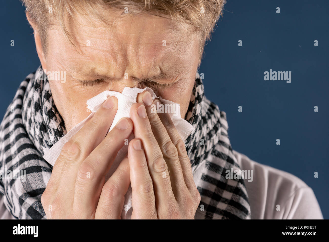 Adult man patient with cold and flu illness relief Stock Photo - Alamy