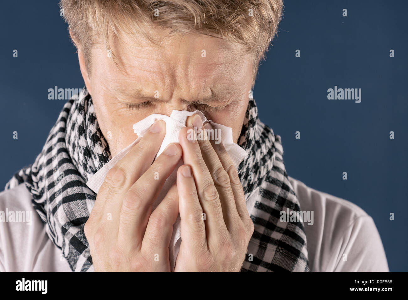 Adult man patient with cold and flu illness relief Stock Photo - Alamy