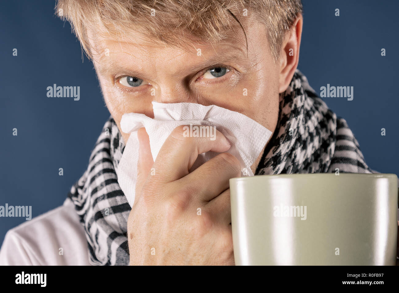Adult man patient with cold and flu illness relief Stock Photo - Alamy
