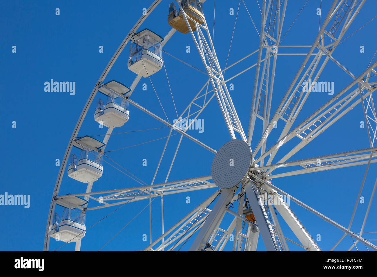 Giant ferris wheel with chairs, metallic structure, recreational ...