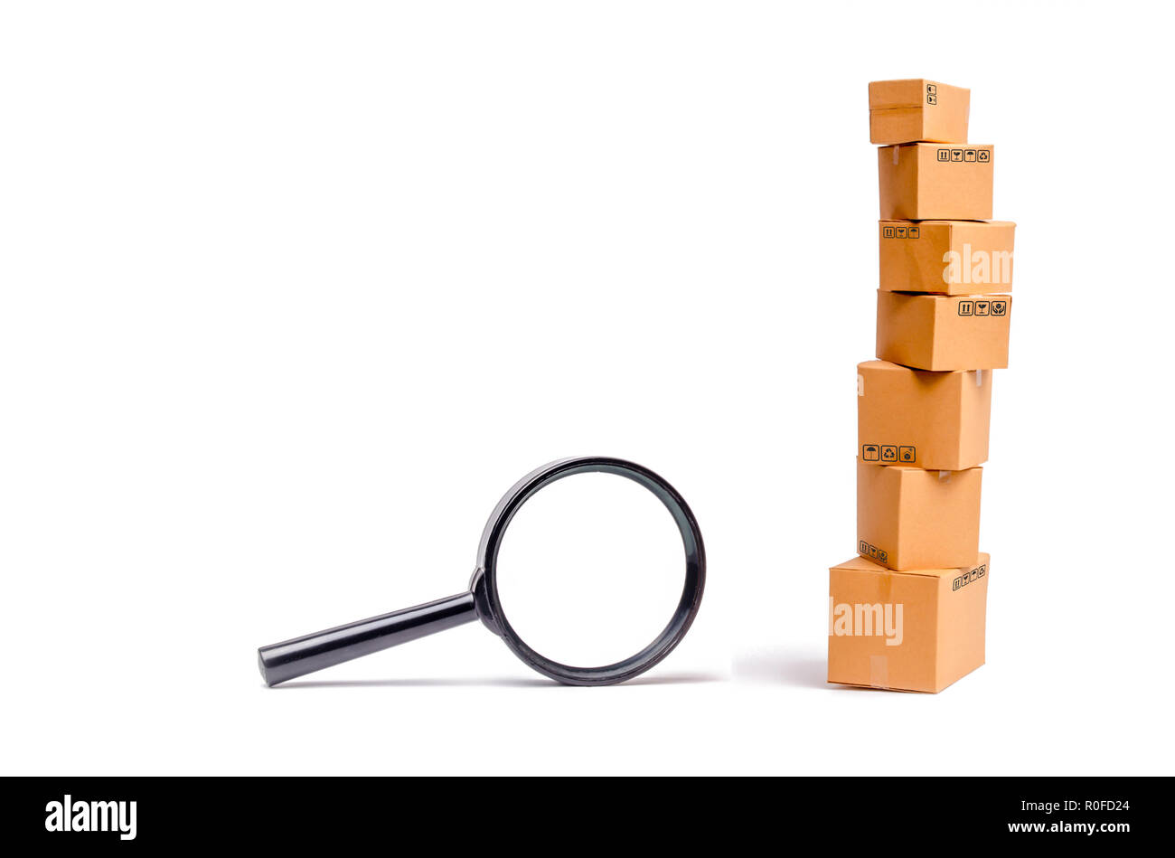 Cardboard boxes and a glass on a white background. The concept of ...