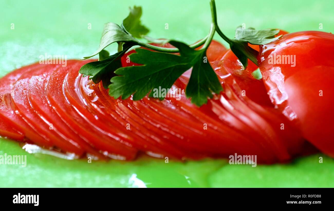 Olive Oil Over Tomato Slices Stock Photo - Alamy