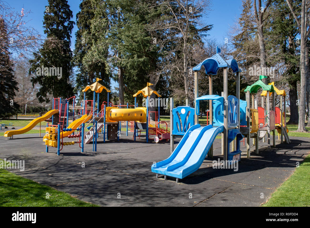 A colorful and fun children's playground in a community park Stock ...