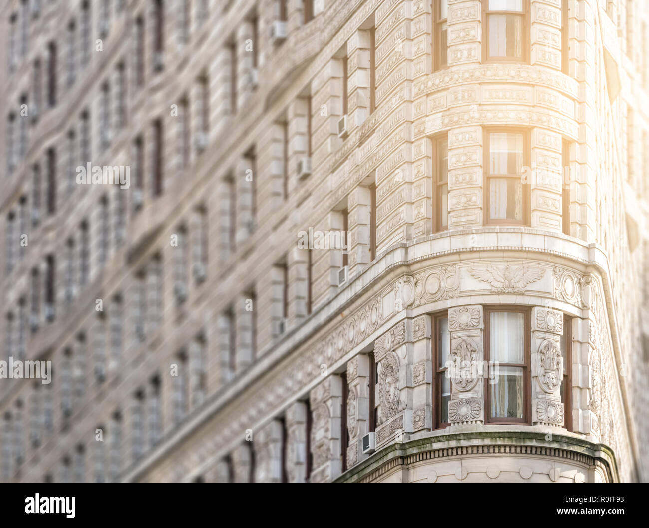 Sunlight shines on windows in old New York City building Stock Photo ...
