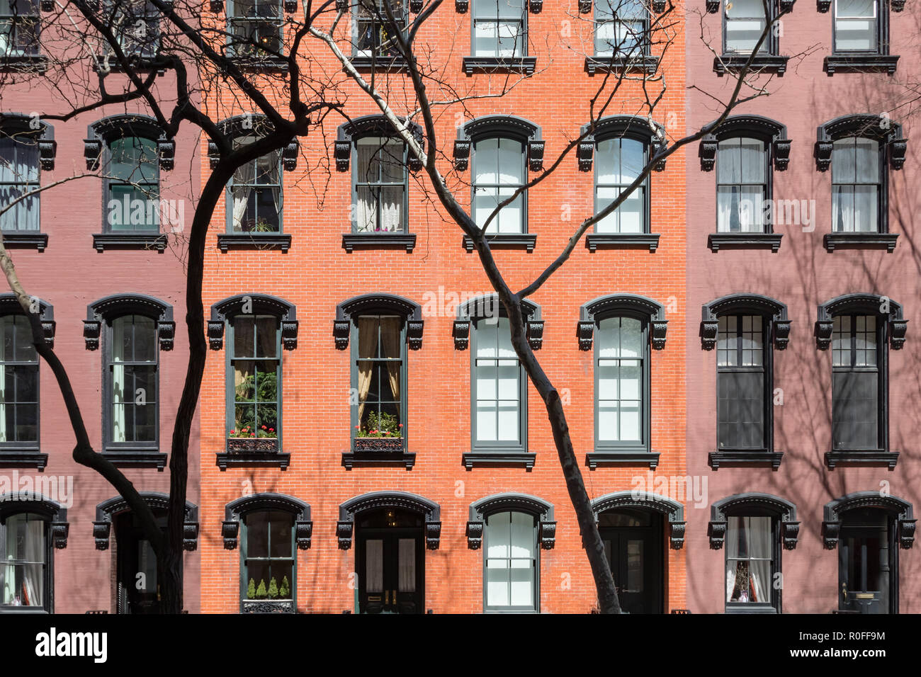 Wall of windows on classic New York City style brick building Stock ...
