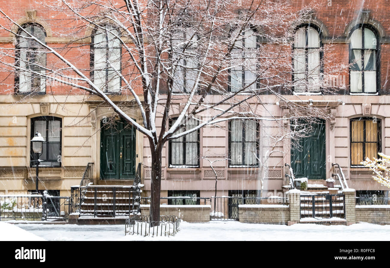 Winter scene with snow covered sidewalks along Stuyvesant Street in the ...