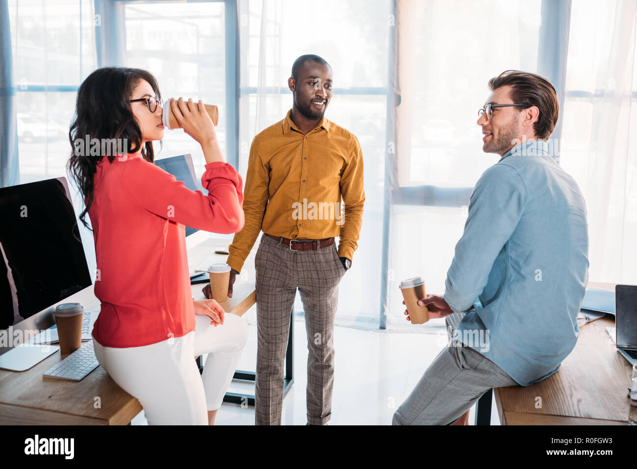 multicultural business people having coffee break during work in office ...