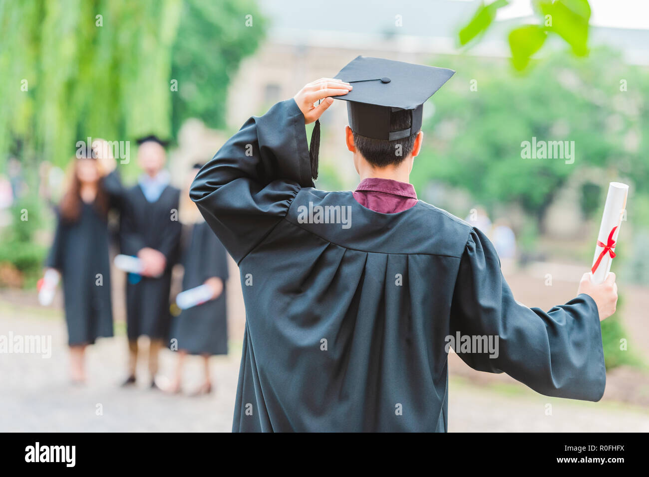 Back view of women graduates hi-res stock photography and images - Alamy