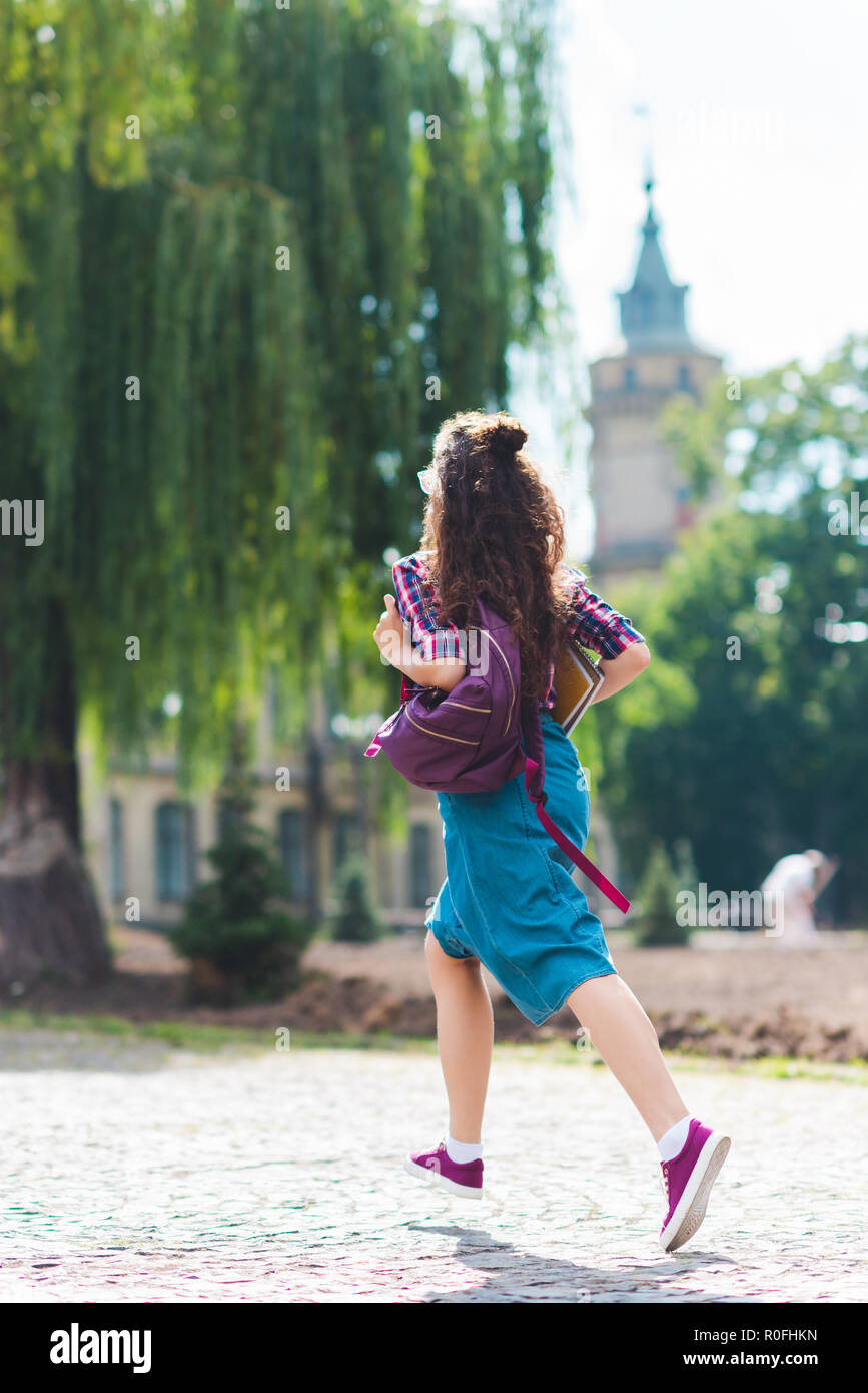 Adult student backpack running hi-res stock photography and images - Alamy