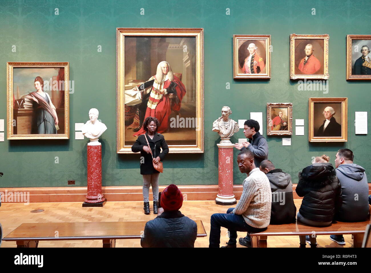Visitors admiring the art at the National Portrait Gallery, London, UK ...