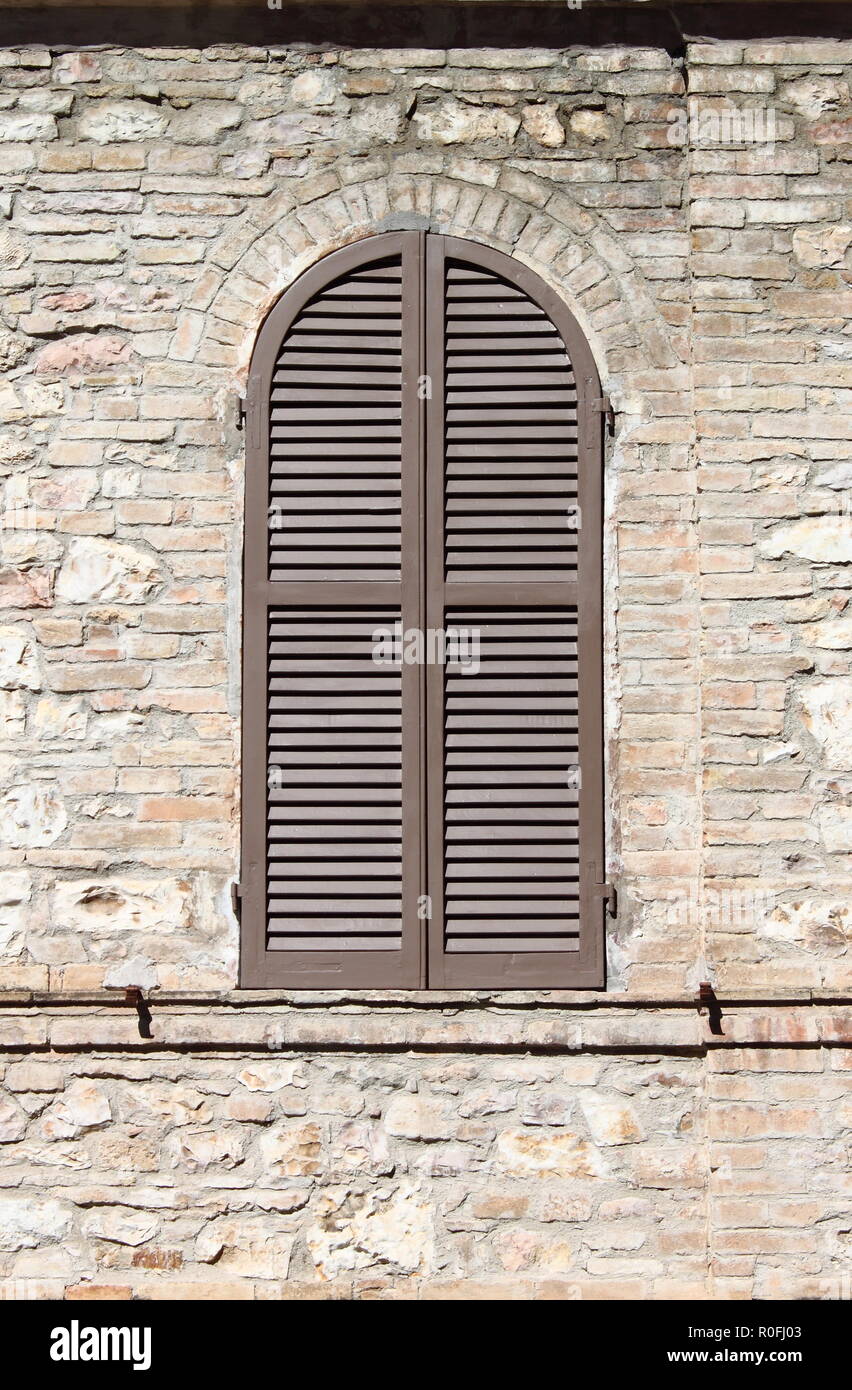 Italian style window with closed shutters Stock Photo - Alamy