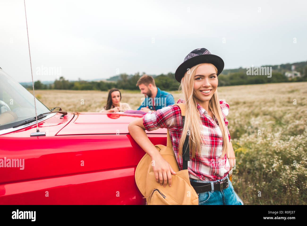 Leaning on back of car hi-res stock photography and images - Alamy