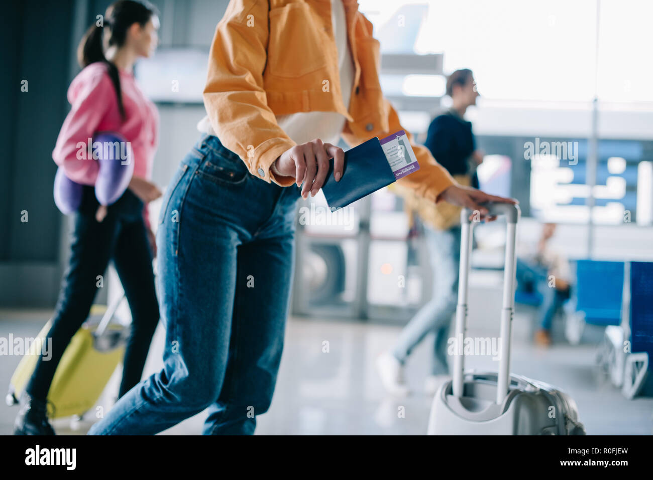 Holding passport and boarding pass hi-res stock photography and images ...
