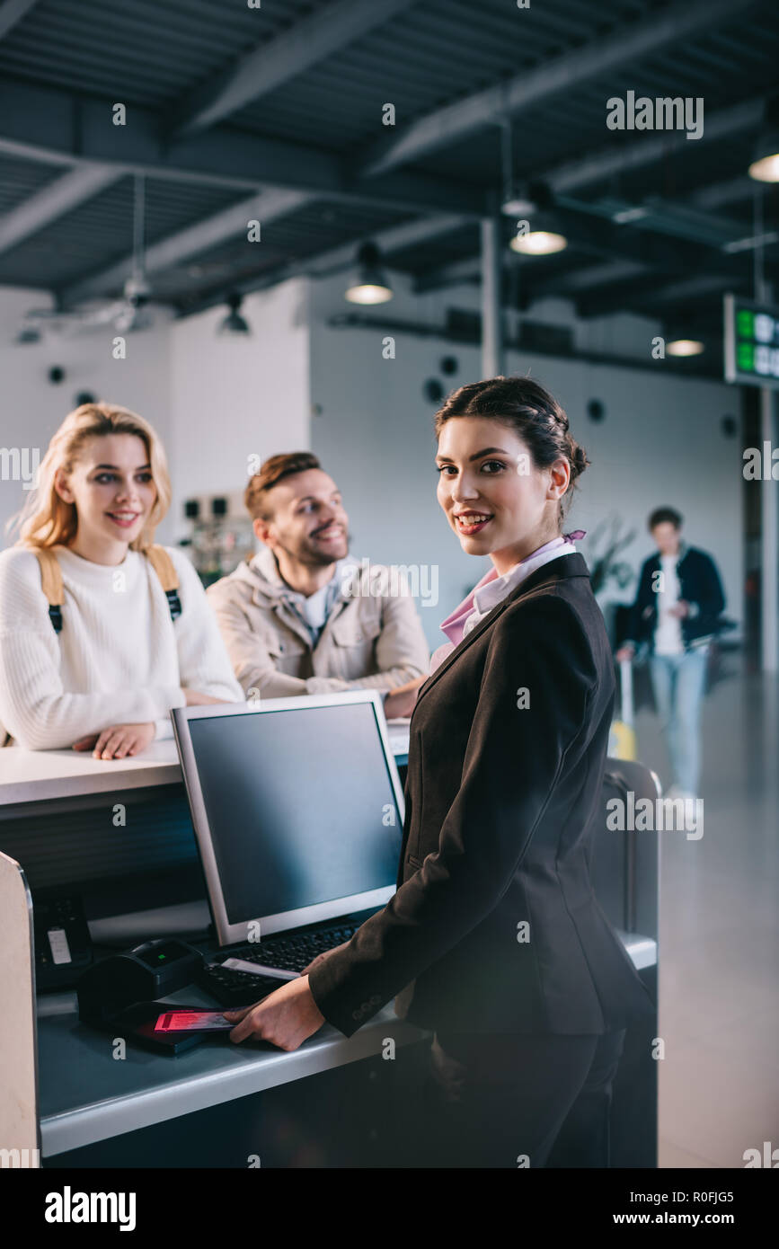 Female staff checking boarding hi-res stock photography and images - Alamy
